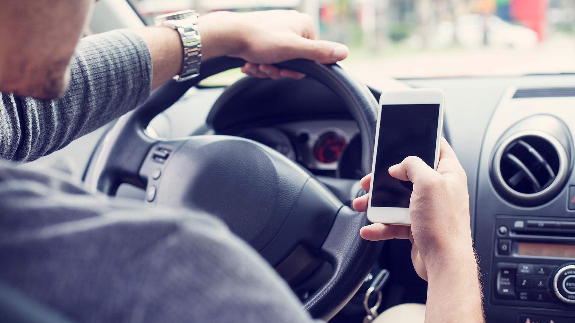 Using A Mobile Phone While Driving (Vic) | Armstrong Legal